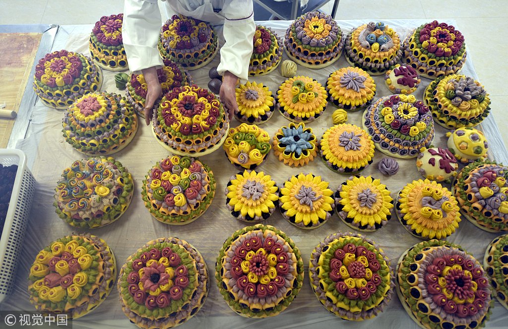 Decorated steamed buns welcome Chinese New Year - China Plus